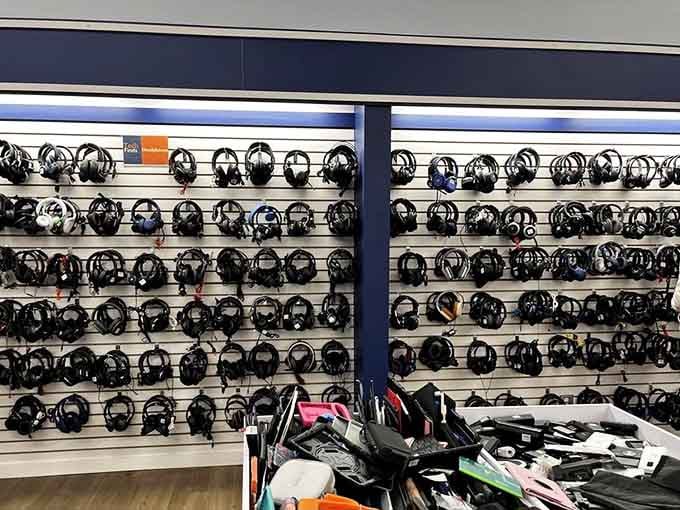 A wall of headphones so impressive it makes you want to sit down and listen to something wonderful.