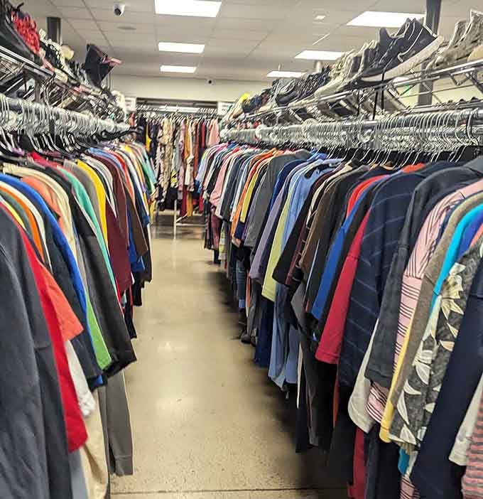 Men's shirts in every color imaginable, organized better than most department stores charging ten times the price here.