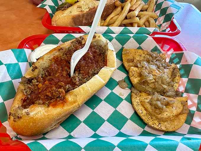 Homemade chili piled high on a hoagie roll. This is comfort food doing its very best work.