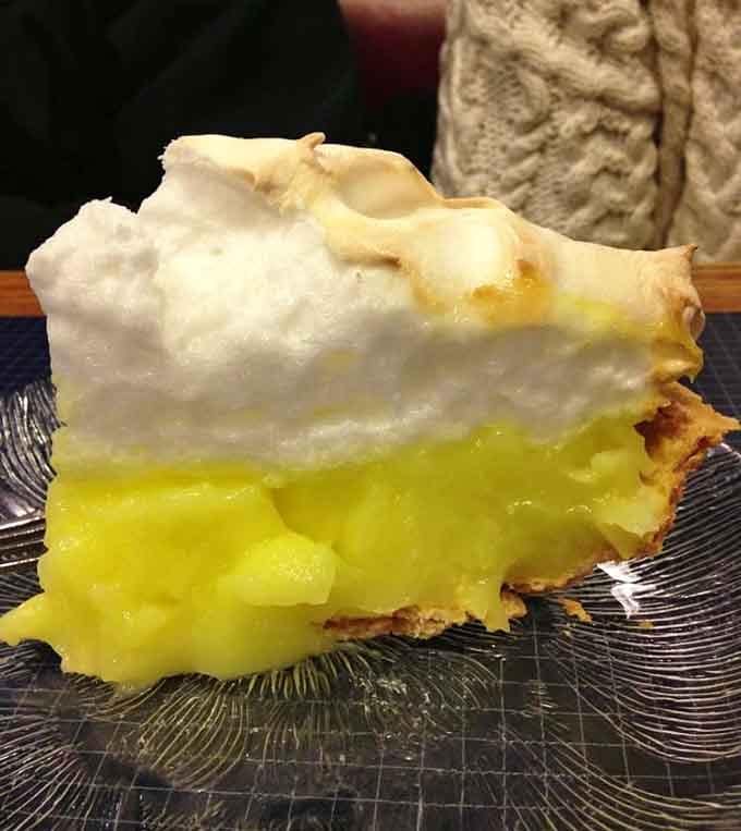 That lemon meringue slice stands tall and proud, like it knows exactly what it's doing to you.