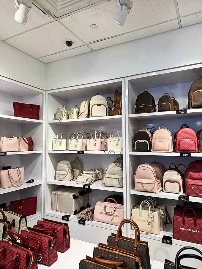 Michael Kors bags lined up like soldiers, ready to march straight into your shopping cart today.