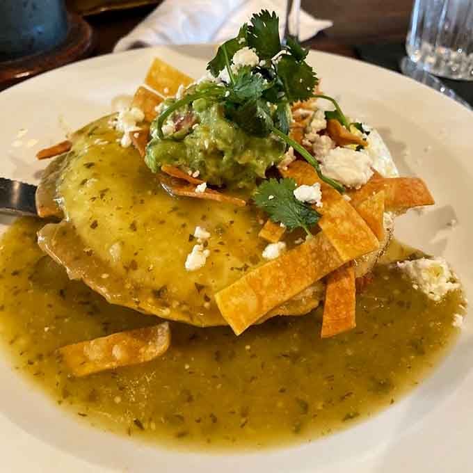 The Matador arrives swimming in green salsa verde, guacamole, and cotija. This brunch plate plays no games whatsoever.