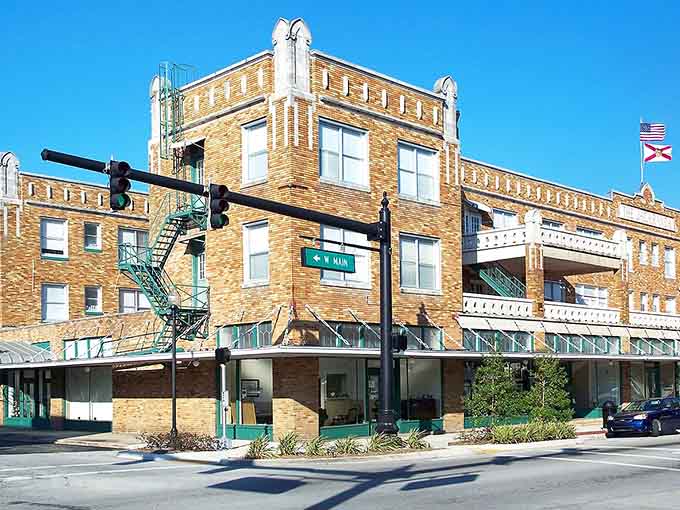 Golden brick, Gothic roofline details, and the American flag flying proudly — Avon Park's West Main corner means business.
