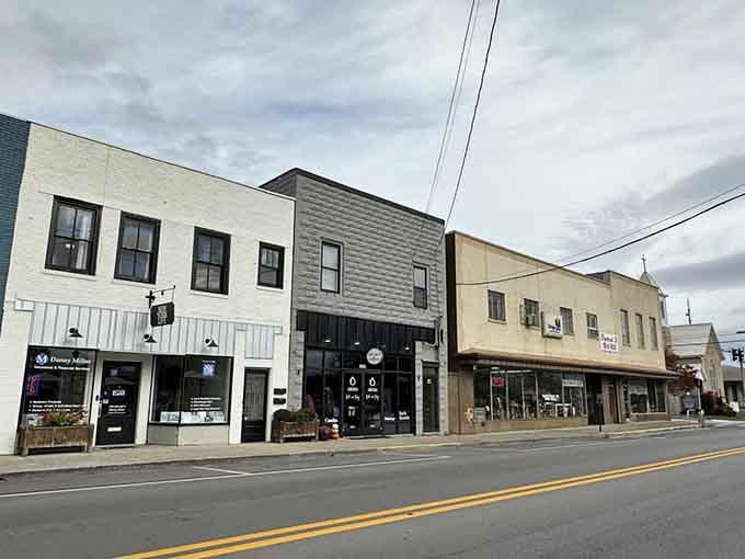 Berea's compact downtown block mixes modern gray facades with older neighbors, a quiet conversation between the town's past and its future.