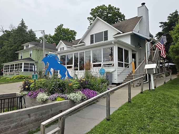 Colorful flower boxes and a cheerful white cottage exterior make this Fish Creek spot impossible to walk past.