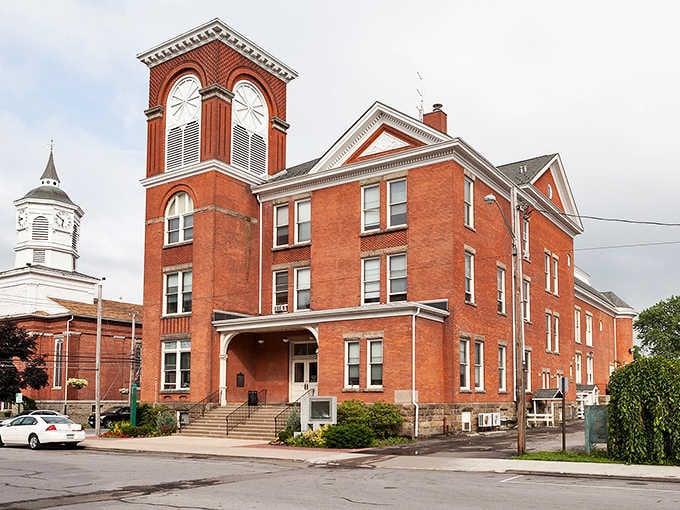 Fredonia's handsome brick civic building stands with its clock tower raised high, like a proud grandfather at graduation.