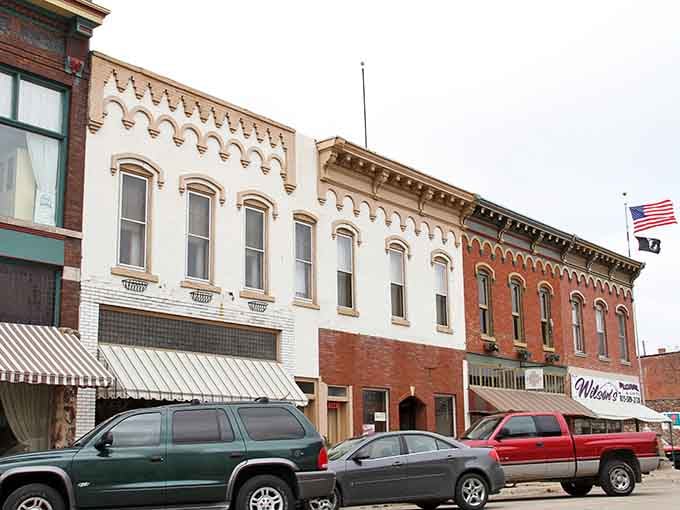Fulton's downtown block wears its ornate 19th-century brickwork like a well-tailored suit, the American flag flying with well-deserved confidence overhead.