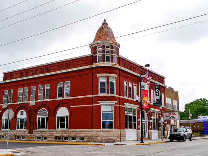 That copper-topped turret rising above rich red brick makes Hotel Seymour look like it belongs on a European postcard.