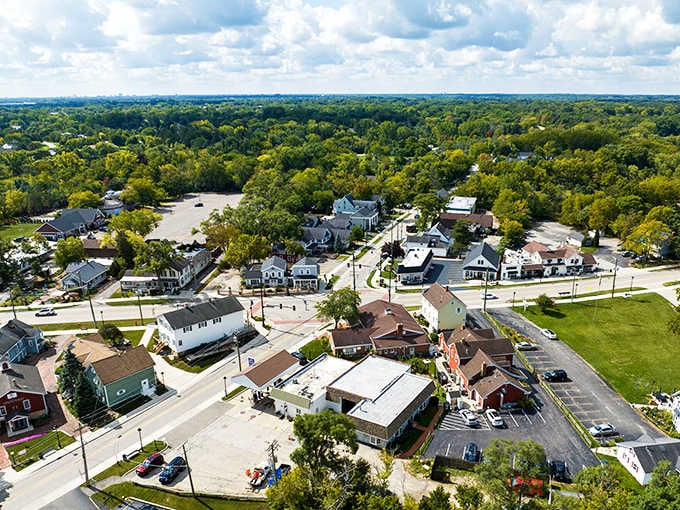 Long Grove spreads out beneath a canopy of green trees like a village that time politely decided to spare.