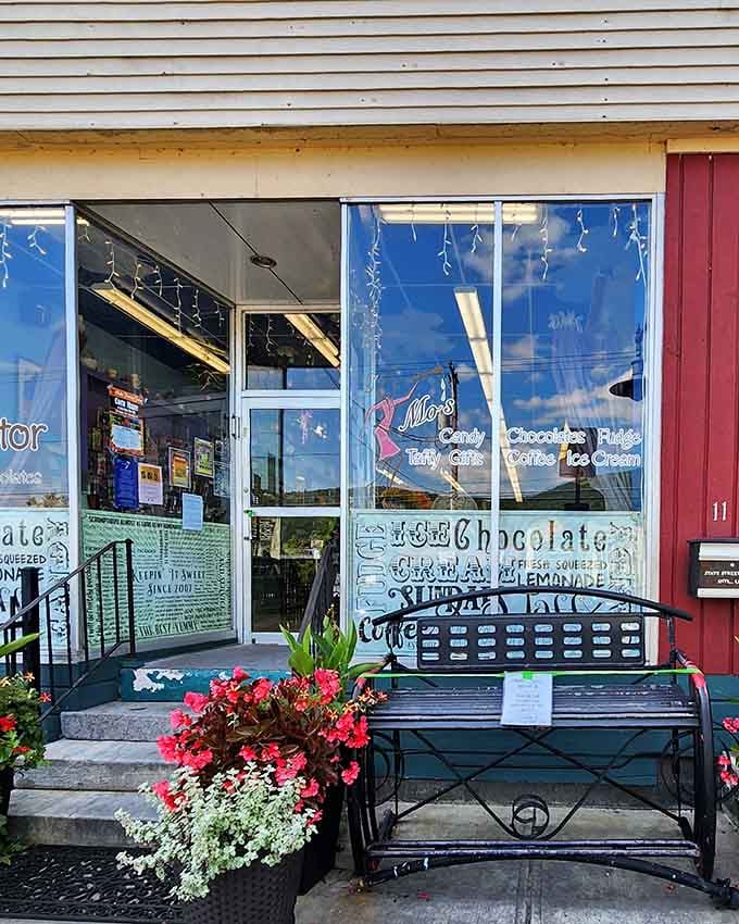 Hand-painted windows, a cozy iron bench, and fresh flowers &mdash; Mo's Fudge Factor is Shelburne Falls charm at its absolute finest.