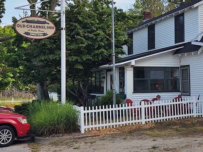 A white picket fence, a welcoming porch, and tall trees &mdash; the Old Channel Inn looks like a Norman Rockwell painting.