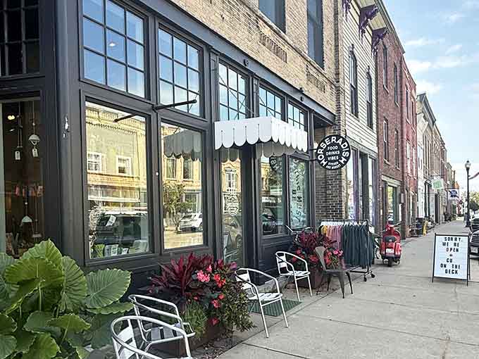 Those sidewalk chairs invite lingering over coffee while watching small-town life unfold at its own unhurried, perfect rhythm.