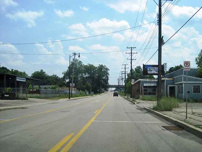 Sharon's open road stretches ahead under a wide summer sky, unhurried and honest in the best possible way.