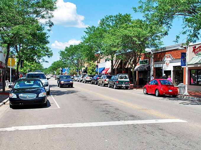 Tawas City's sun-drenched main street stretches out invitingly, lined with local shops wearing their colorful signs like friendly name tags at a party.