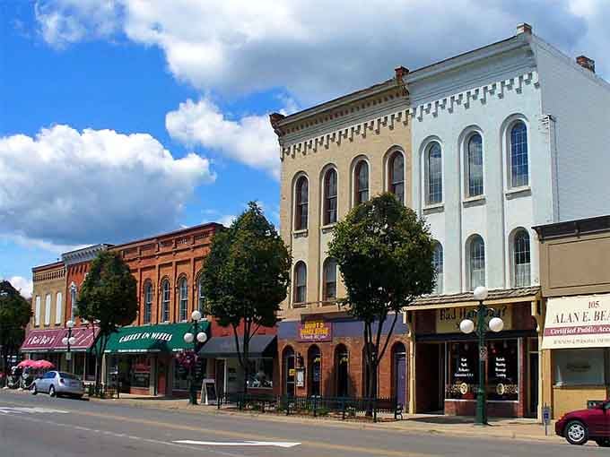 These grand facades with their arched windows remind you that small towns once built things to last forever.