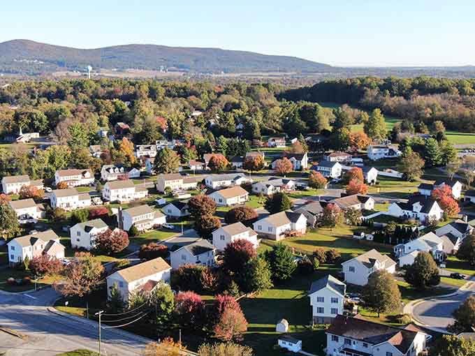 Thurmont spreads across a valley with the Catoctin Mountains blazing in autumn color behind it, looking exactly like a screensaver you'd actually want to live in.