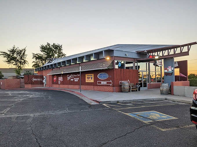 Golden hour lighting makes this brick-and-wood exterior glow like a beacon calling hungry travelers off the highway.