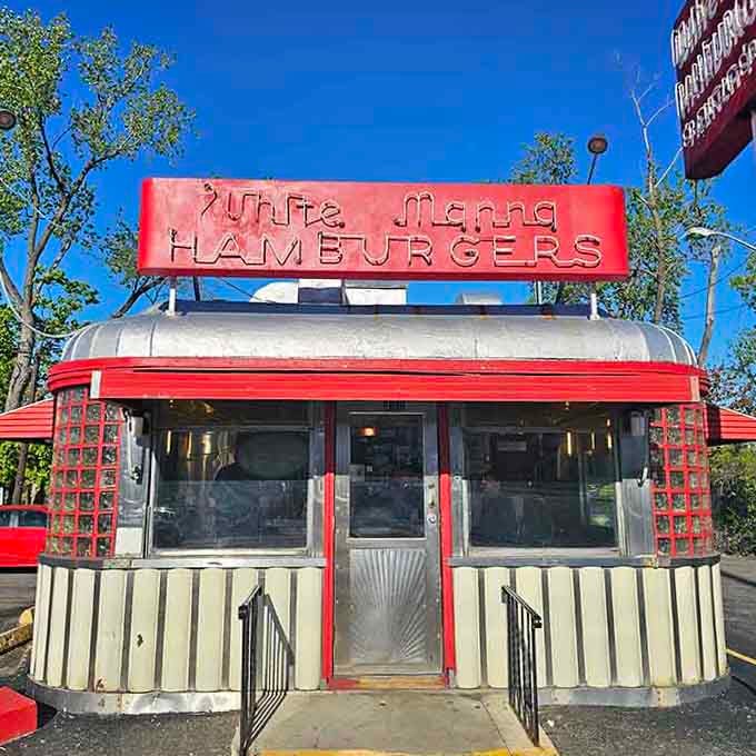 That bold red sign practically shouts "HAMBURGERS" like a delicious beacon visible from three counties away on sunny days.
