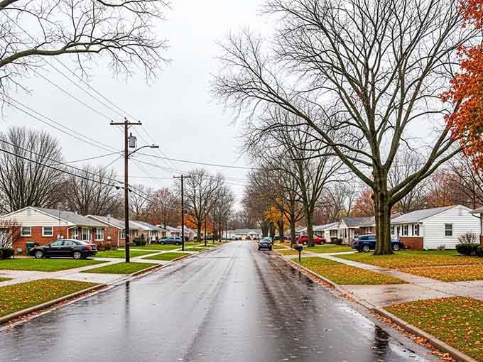 Zanesfield's rain-soaked street lined with tidy bungalows and blazing autumn trees looks like a Norman Rockwell painting that got a little wet.