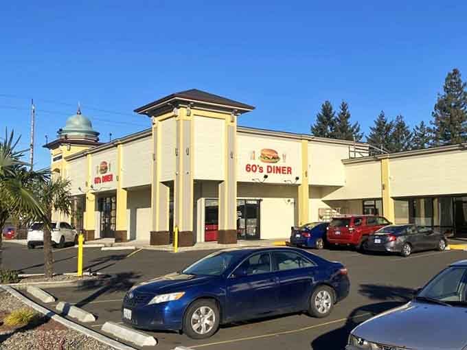 Crisp winter light hits the 60's Diner's warm yellow facade just right, making this Tualatin strip mall feel surprisingly inviting and full of promise.