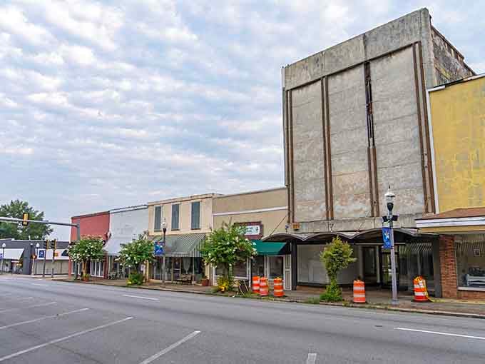 Orange construction barrels and weathered facades tell Americus's honest story, a town with real bones and a future still being written.