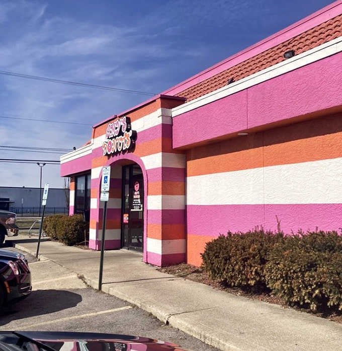 Up close, Amy's bold striped exterior practically vibrates with color, like a candy wrapper that somehow became a beloved donut shop.