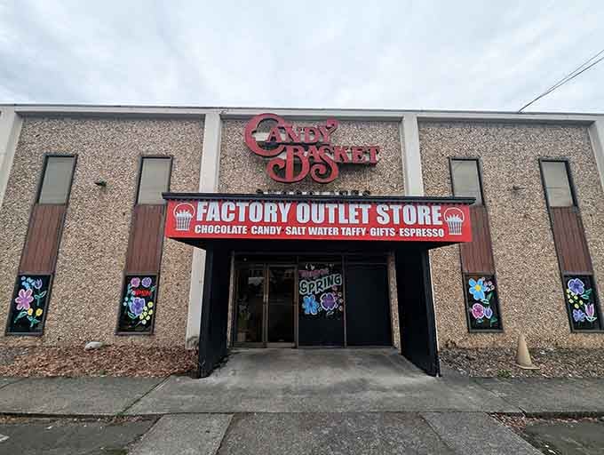Colorful spring flowers painted on the entrance windows make Candy Basket's factory store look as cheerful as what's waiting inside.