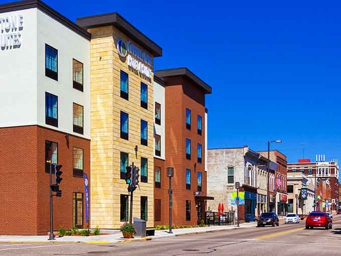 Chippewa Falls showcases a main street with ornate stonework and a polished charm that feels both welcoming and timeless.