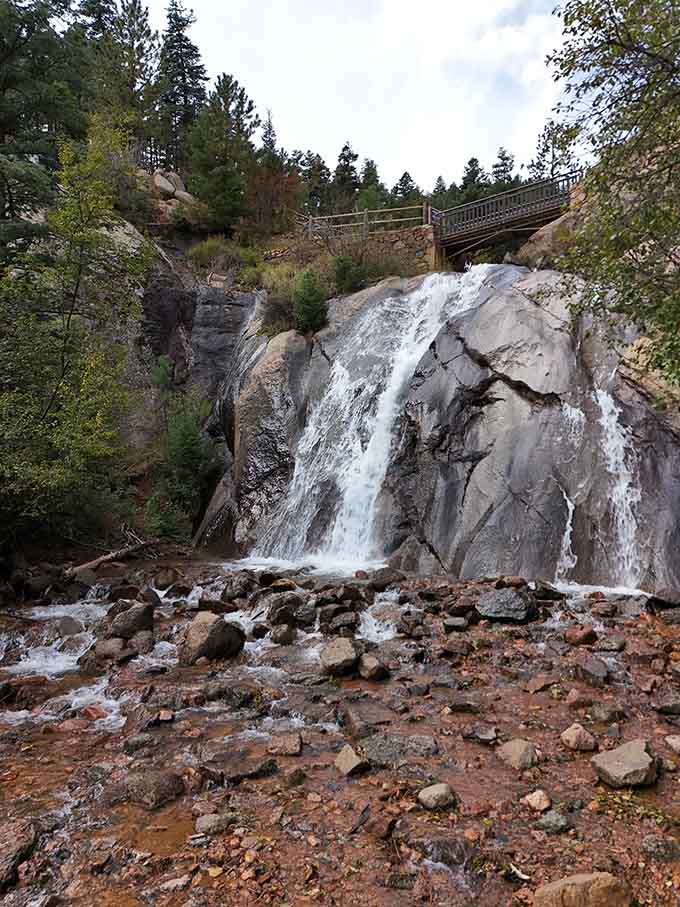 Autumn leaves and a classic wooden bridge frame Helen Hunt Falls in a way that feels like a warm hug from the Colorado foothills.
