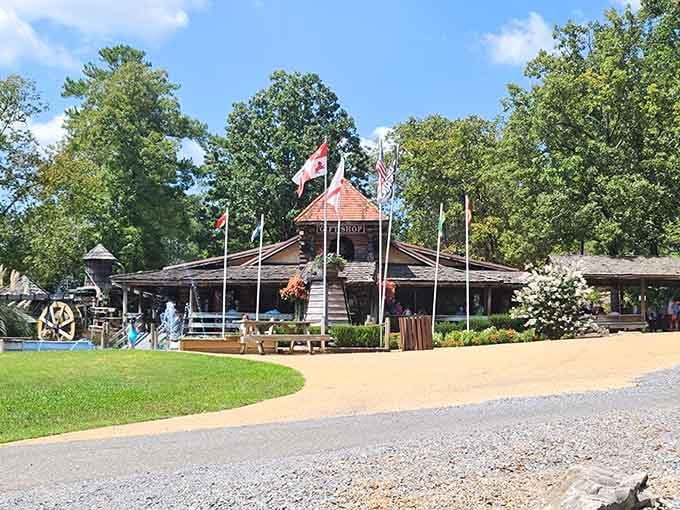 Flags flying, log cabin charm gleaming, and a gift shop that promises souvenirs worth every penny.