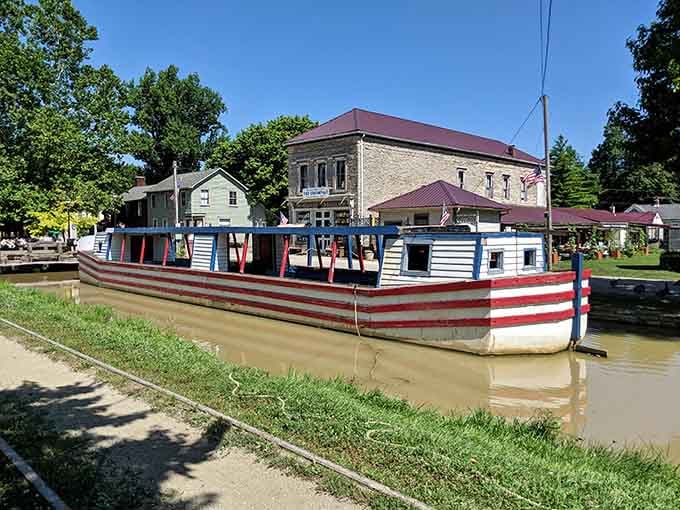 This patriotic canal boat looks ready to transport passengers back to when waterways were highways and life floated by peacefully.