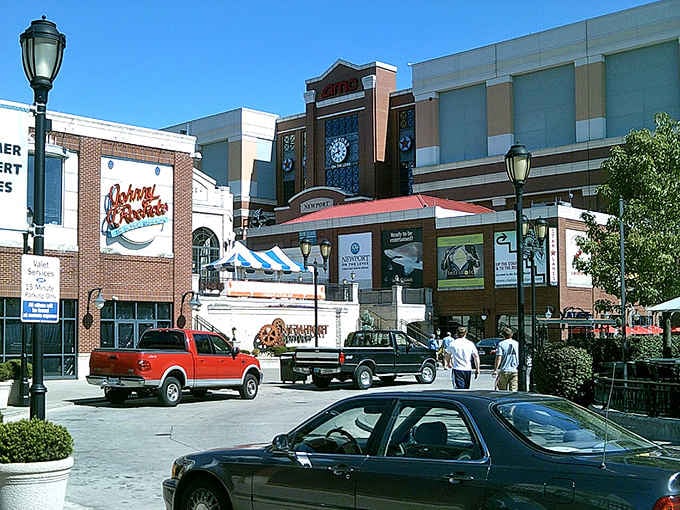 That retro sign and bustling sidewalk energy capture a town where old-school charm serves up new-school flavor every single day.