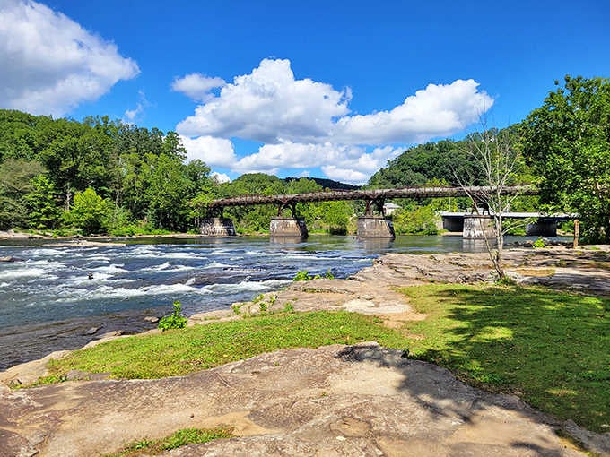 Where rushing water meets historic bridges, nature puts on a show that's been running longer than any theater.