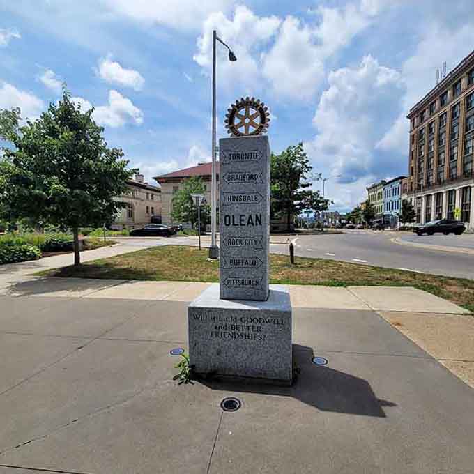 Olean's friendly Rotary directional marker points toward nearby cities, reminding everyone that great neighbors and good friendships are always worth celebrating!