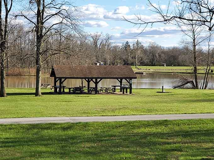 A lakeside picnic shelter, still water, and bare winter trees make Ouabache feel like a painting mid-brushstroke.
