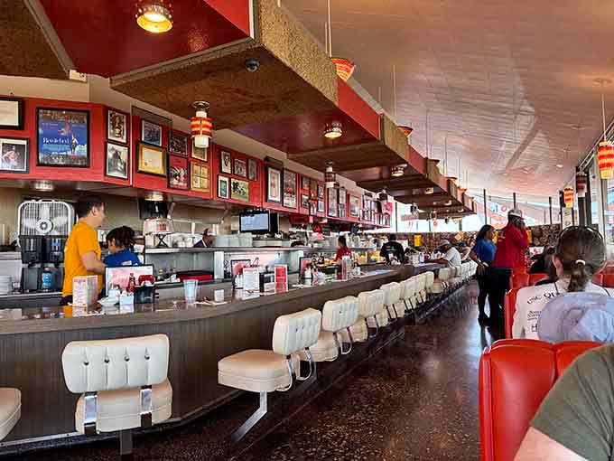 That long curved counter stretching deep into Pann's dining room, lined with framed artwork overhead, is a beautiful invitation to slow down and stay awhile.