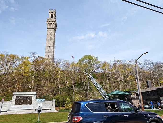 Seen from the bustling visitor area below, the Pilgrim Monument soars skyward &mdash; a proud, unmistakable Cape Cod landmark.