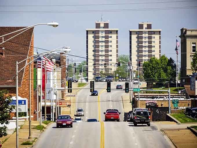 Poplar Bluff's broad main corridor stretches toward twin high-rise towers, a town that quietly grew up without making a fuss about it.