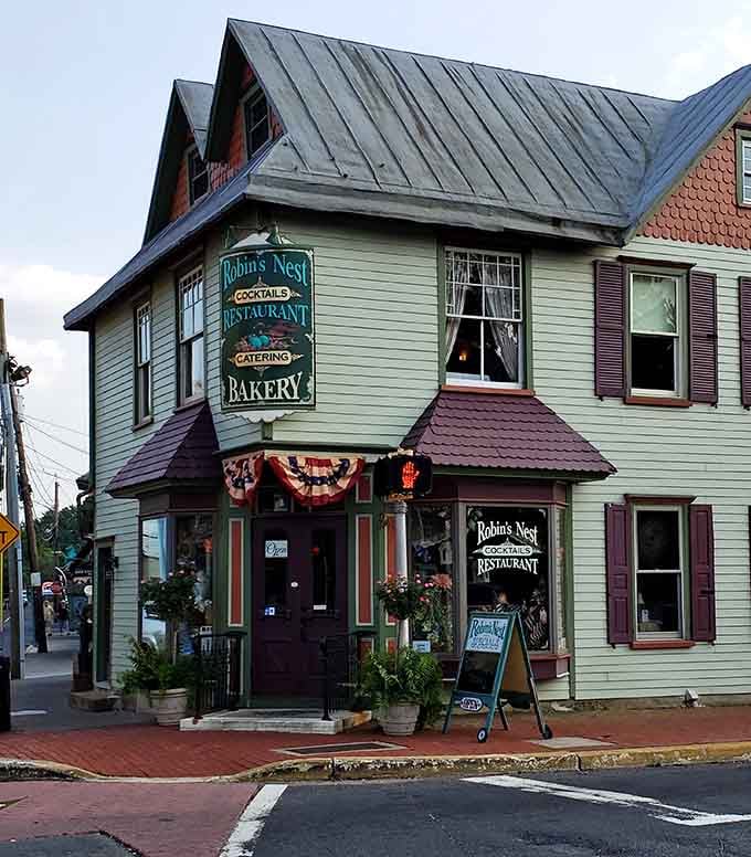 Patriotic bunting, an open sign, and flower boxes bursting with color. Robin's Nest is ready for you.