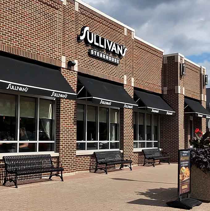 A row of crisp black awnings stretches the full length of Sullivan's brick facade, lined up as neatly as a jazz band ready to perform.