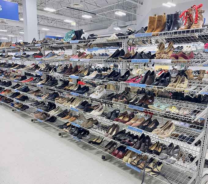 Boots, flats, heels, and sneakers lined up across multiple shelves, Cinderella would have needed a whole afternoon to get through this section.