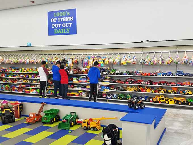 Kids discovering treasure in the toy section, proving that joy really doesn't need a price tag attached.