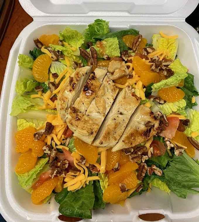 Grilled chicken, mandarin oranges, pecans, and cheddar. Proof that a diner salad can absolutely steal the whole show.