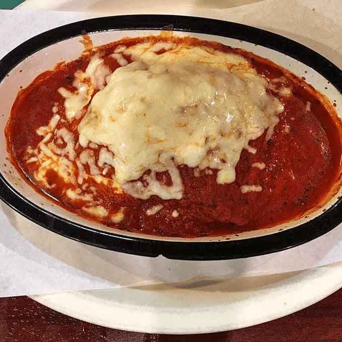 Bubbling tomato sauce, melted cheese piled high. This lasagna is the culinary equivalent of a warm, reassuring hug.
