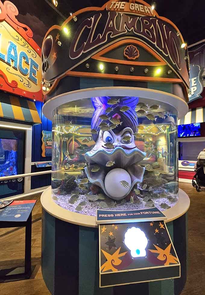 The Great Clambino is ready to tell your fortune, and the striped fish swimming around it are clearly in on the joke.
