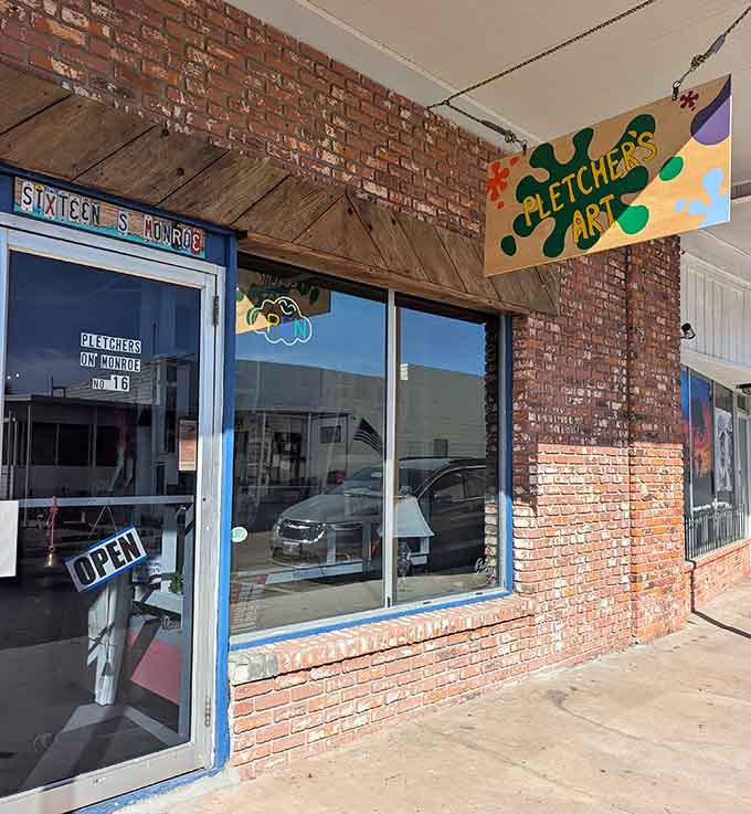 Pletcher's Art on Monroe Street proves that the best creative spaces often hide behind cheerful handmade signs on well-worn brick walls.