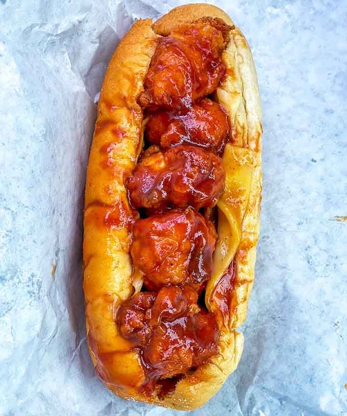 Saucy, generous, and completely unapologetic, this BBQ chicken sandwich is the kind of thing you eat with both hands and zero regrets.
