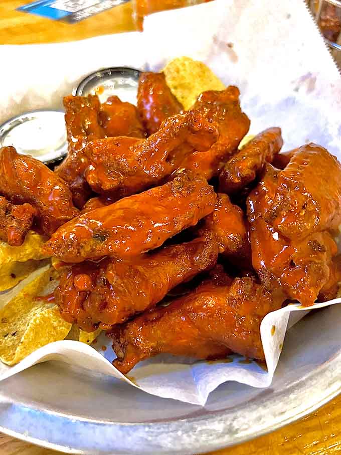 A mountain of saucy wings that could make a grown adult weep with joy. Pass the napkins, please.