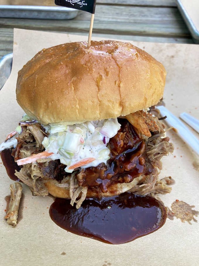 A pulled pork sandwich piled this high with coleslaw is messy, delicious, and absolutely worth every napkin you'll need.