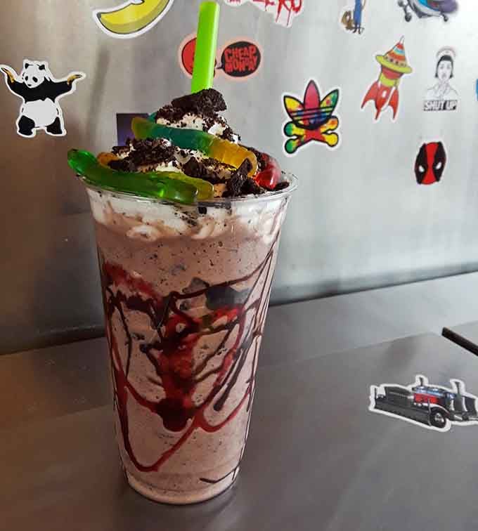 Oreo crumbles, gummy worms, chocolate drizzle, and whipped cream. This shake skipped dessert and went straight to the victory lap.